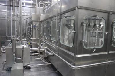China 1500ml Juice Filling Machine 3-in-1 Monoblock Stainless Steel PET Bottle Filler 18 Valves for sale