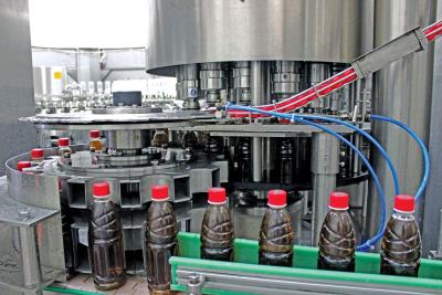 China 54000 bph Juice Filling Machine PET Bottle Beverage Production Line 3-in-1 for sale