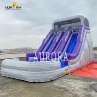 China Custom Purple Gray Inflatable Water Slide With Climbing Wall For Adventure Seekers for sale