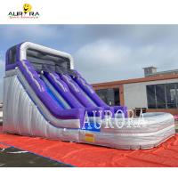 China Custom Purple Gray Inflatable Water Slide With Climbing Wall For Adventure Seekers for sale