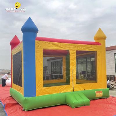 China Jumping Inflatable Bounce House With Air Blower Yellow Blue Green Red for sale