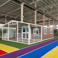 China Double Wing Luxury Expandable Container House With Extra Roof & Veranda for sale