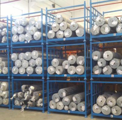 China Heavy Duty Detachable Metal Fabric Roll Racking System Stacking Pallet Storage Racks for sale