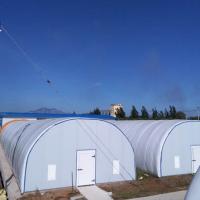 China Heat Preservation Heavy Duty Plastic Greenhouse With Customized Length for sale