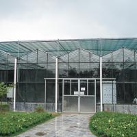 China Advanced Glass Modern Greenhouse For Optimal Light Transmission And Heat Preservation for sale