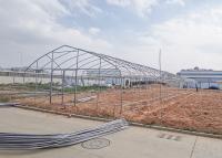 China Commercial Woven Polytunnel Greenhouse Kits Heavy Duty Poly Tunnel for sale