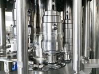 China CGF Series PET Bottle Filling Machine - 15000 BPH Capacity, 32 Filling Heads, 6 kW Power for sale