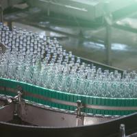 China DCGF40-40-12BH 3-in-1 Automatic Glass Bottle Filling Machine - 12,000 BPH Capacity for Carbonated Drinks for sale