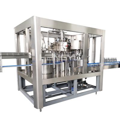 China Automatic Carbonated Drink PET Bottle Filling Machine 2000BPH Capacity with PLC Control for Soda Production Lines for sale