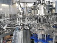 China Automatic Carbonated Drink PET Bottle Filling Machine 2000BPH Capacity with PLC Control for Soda Production Lines for sale