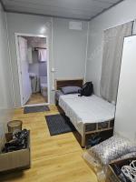 China Flat Pack Prefabricated Storage Buildings Containers Construction Site Hut for sale
