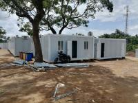 China Industrial Temporary Construction Camp Industrial Prefabricated Container Building Warehouses for sale