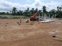 China Industrial Temporary Construction Camp Industrial Prefabricated Container Building Warehouses for sale