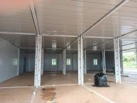 China Prefabricated Building Flat Pack Container Unit with Hot-Dip-Galvanized Steel Frame and Fire-Retardant Fiberglass Sandwich Panels for Mining Site Temporary Staff Quarters for sale