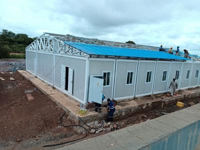 China Prefabricated Building Flat Pack Container Module with Rockwool Sandwich Panel and Galvanized Steel Frame for 20-foot Standard Temporary Housing for sale