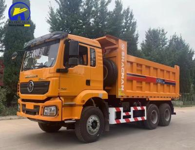 China Shacman 6X4 Dump Truck with Euro 3 Engine F3000 Flat Roof Cab Bucket Dimension 5800X2300X1500 for sale