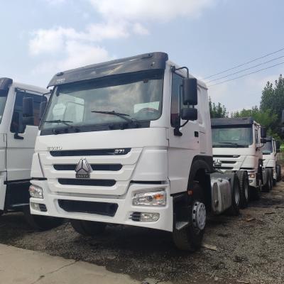 China Sinotruk HOWO 371 Tractor Head Camion for Tanzania at 50 /90 Optional Traction Base for sale