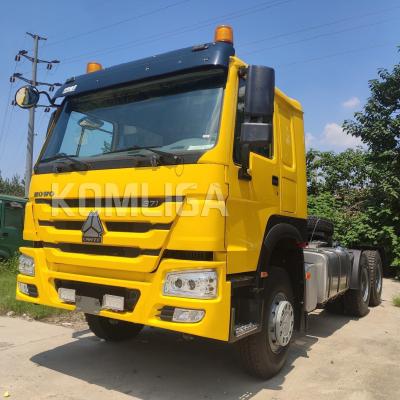 China Euro4 Emission 2014 Yellow Used Tow Truck Trailer Towing Design Tractor Head Trucks for sale