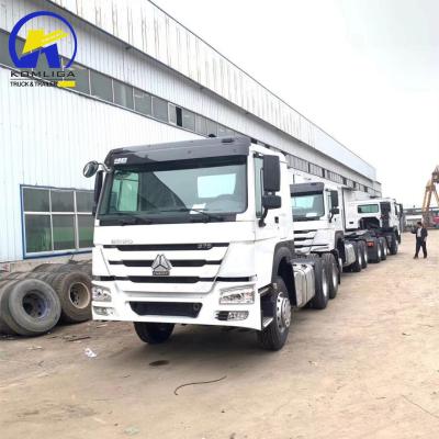 China Radial Tire Design 16 Tons Rear Axle Sinotruck HOWO 6X4 20-30ton Tactor Head Truck for sale