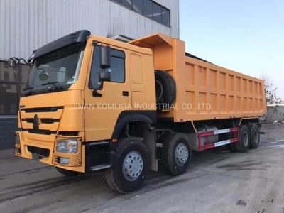 China Cnhtc HOWO Sinotruk 8X4 Dump Truck/Tipper Truck/Heavy Duty Truck with 300L Fuel Tanker for sale