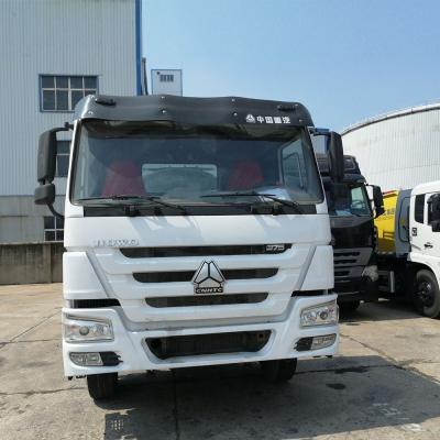 China Radial Tire Design Sinotruk HOWO 6X4 375HP Good Condition Tractor Truck Sleeper Cab for sale