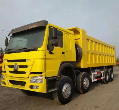 China Ventral Tipper Hydraulic Lifting Sinotruk HOWO 8X4 Dump Truck with 50 Load Capacity for sale