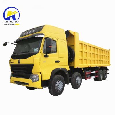 China Sinotruk 8X4 HOWO-T7h 420HP Tipper/Dump Truck with 300L Fuel Tanker for sale