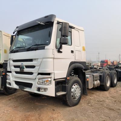 China Second Hand Sinotruk HOWO 6X4 Heavy Duty Trailer Head Tractor Truck with and ≤5 Seats for sale