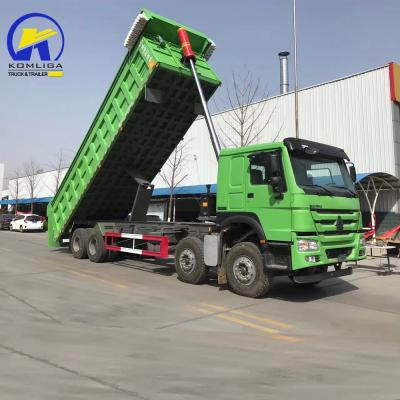 China Second Hand Sinotruck HOWO 8X4 40-50 Tons Dump Tipper Truck with 300L Fuel Tanker for sale