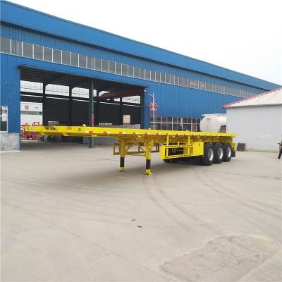 China Yellow 3 Axles Flatbed Semi Trailer 40FT 48FT with Side Beam 16mm Channel Steel for sale