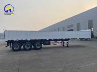 China 3alxes Used Fence Cargo Flatbed Semi Trailer for Self-dumping 30-100t Loading Capacity for sale