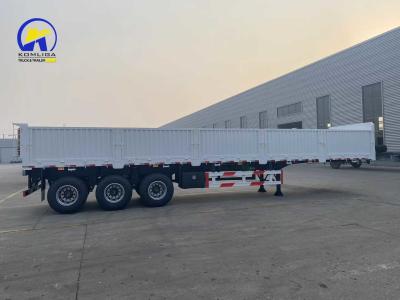 China 3alxes Used Fence Cargo Flatbed Semi Trailer for Self-dumping 30-100t Loading Capacity for sale