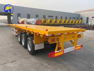 China Heavy Duty Transportation 3 Axles 4 Axles Flatbed Semi Trailer with 1820mm Tread for sale