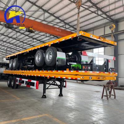 China 20FT 40FT Heavy Duty Platform Flatbed Container Semi Trailer with 4 Axles to Tajikistan for sale