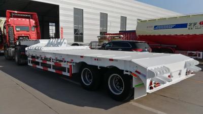 China Sinotruk HOWO 3axle 60t Semi Lowbed Trailer with Ramp 7000-8000mm Wheel Base Flatbed for sale