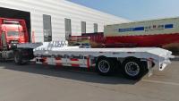 China 2-5 Axles Sinotruk Lowbed Semi Trailer with Landing Gear 30-100t Capacity 12 Tires for sale