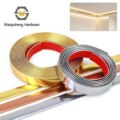 China Self-adhesive PVC Flat Straight Strip Gold Plastic Edge Trim Decorative Edge Wrapping Strip for Background Wall for sale