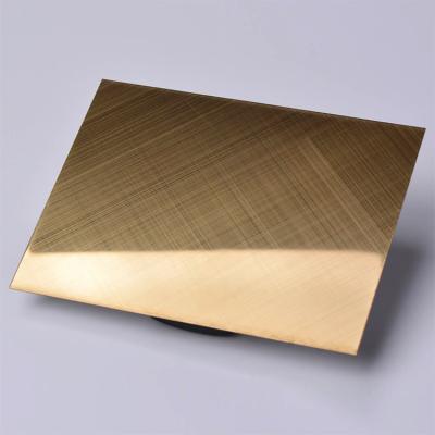 China 1mm 1.2mm Brushed Stainless Steel Sheet Metal 316L 430 Golden Cross Vibration Hairline for sale