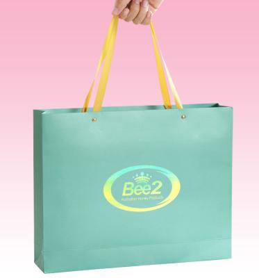 China custom luxury Paper Bag supplier with holographic logo printing for sale
