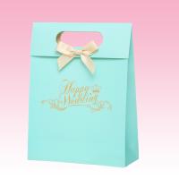 China custom promotional paper carry bag for gift with die-cutting handle manufacturer for sale