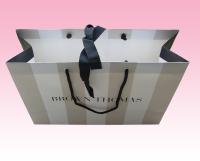 China custom ODM paper shopping bag suppliers with eyelet black cotton rope for sale