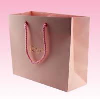 China custom luxury paper gift bag factory with embossed red hot stamping logo for sale