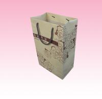 China custom handmade paper bag sizes with embossed hot stamping logo for sale