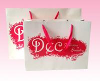China custom elegant white paper shopping bags bulk for wigs maufacturer for sale