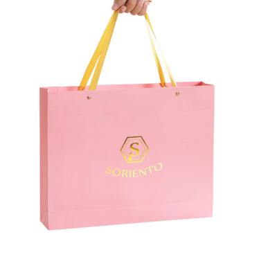 China custom luxury paper party bags factory with satin ribbon rope for sale