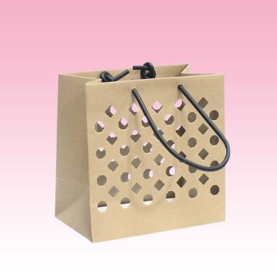 China custom plain brown paper bags printing manufacturer with hollow for sale