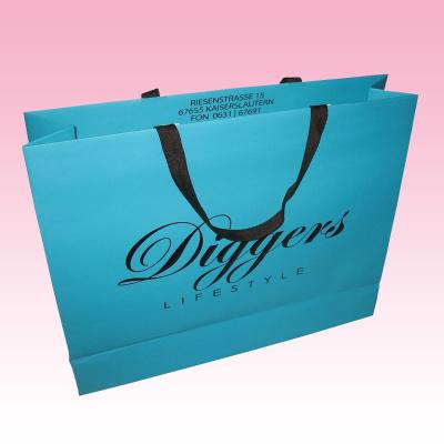 China custom blue paper merchandise bags printing manufacturer with full color for sale