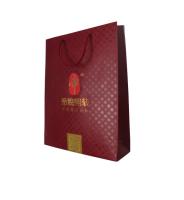 China custom recycled paper gift bags printing in bulk with UV coating manufacturer for sale