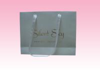 China custom decorative gray paper retail bags wholesale with green hot stamping logo for sale