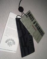 China custom printing paper price hang tags wholesale for sale with plastic seal tag for sale